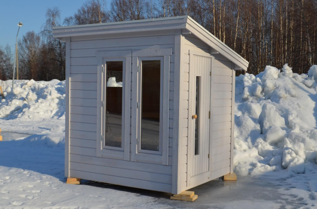 Vedeldad bastustuga - En byggsats från Träbyggarna